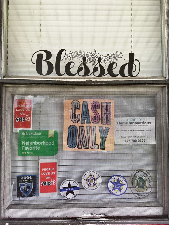 "Blessed" and "Cash Only" signs tell you everything about priorities here: gratitude first, modern payment conveniences second.