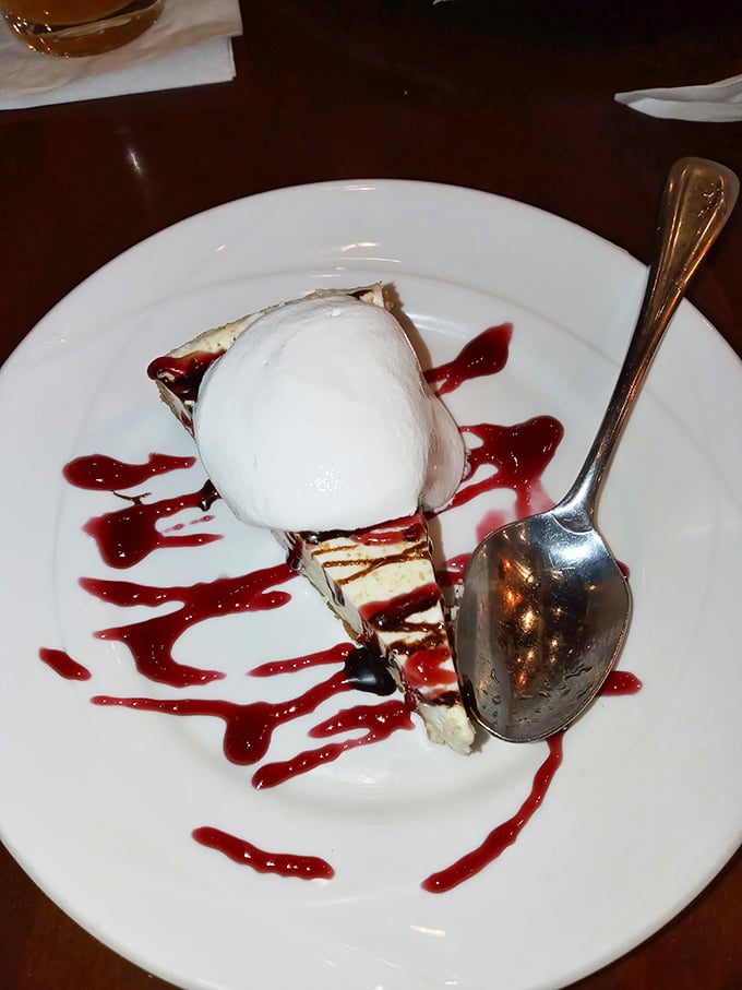 Cheesecake that doesn't need to show off with unnecessary frills. The raspberry sauce adds just enough tartness to cut through the creamy decadence.