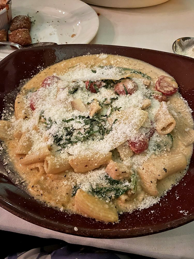 The legendary Chicken Rigatoni &ndash; a creamy, tomato-kissed masterpiece that's worth crossing state lines for, with pasta tubes perfectly capturing every drop of sauce.