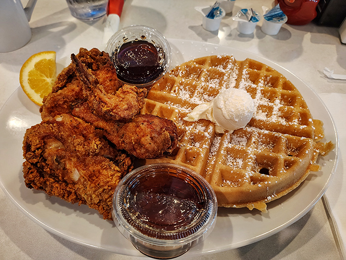 Chicken and waffles: the food equivalent of a perfect marriage. Crispy meets fluffy, savory meets sweet, and your fork meets true happiness.