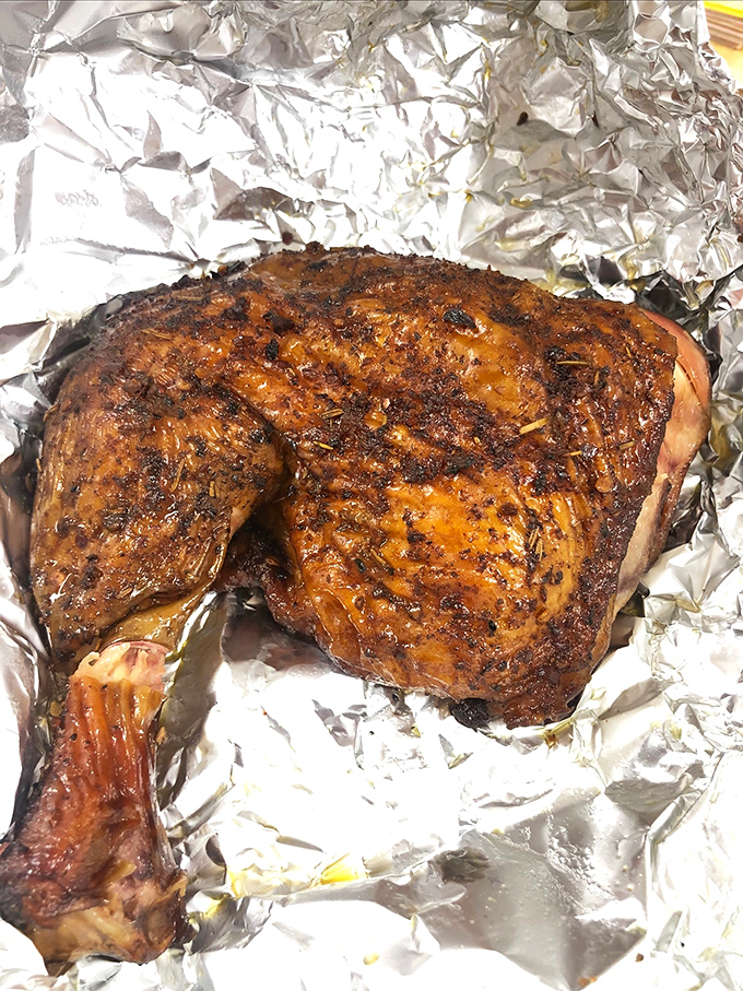 Chicken that's been lovingly coaxed to perfection, with skin so beautifully burnished it looks like it's been sunbathing in flavor.