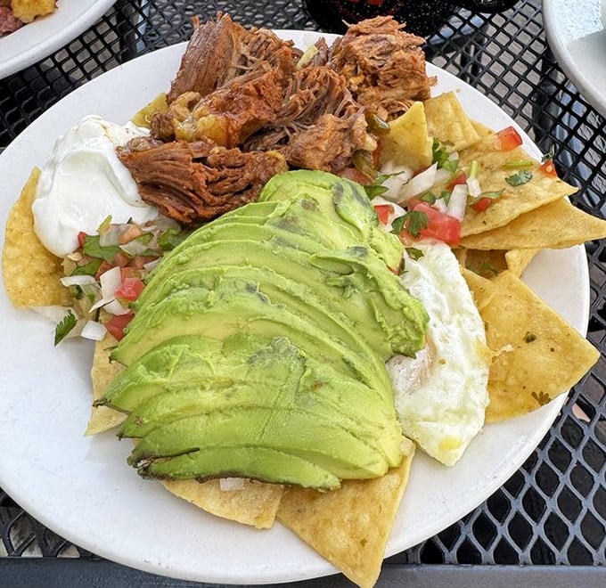 Chilaquiles that make you question why you'd ever eat anything else for breakfast&mdash;crispy, creamy, and topped with avocado slices of dreams.