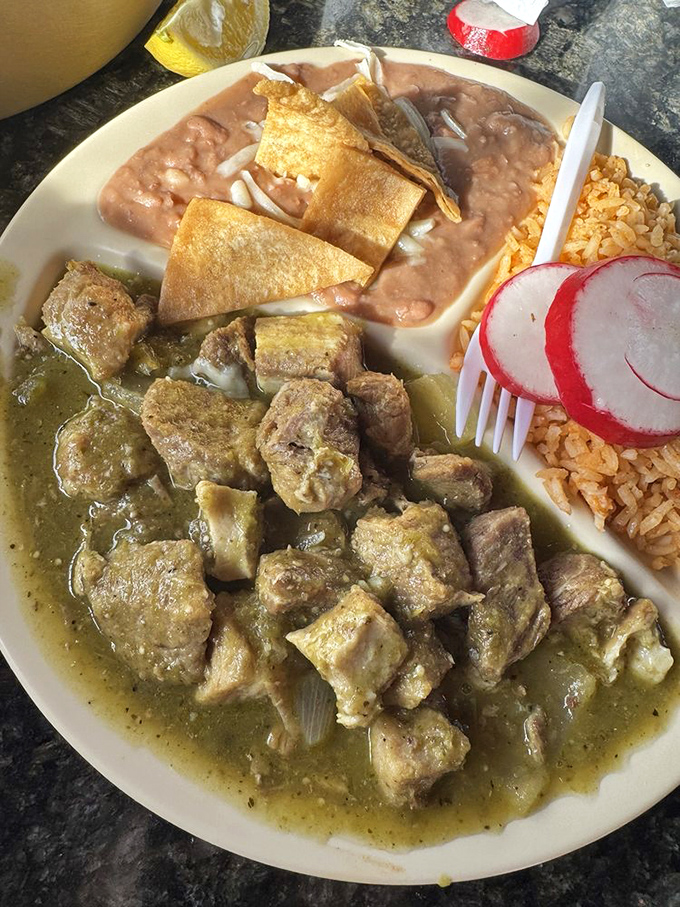 The chile verde showcases tender pork swimming in tangy green sauce &ndash; comfort food that warms you from the inside out.