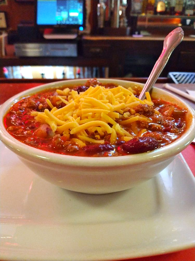 A bowl of homemade chili topped with a crown of shredded cheddar &ndash; the kind of soul-warming comfort that makes Pennsylvania winters bearable and summer evenings complete.