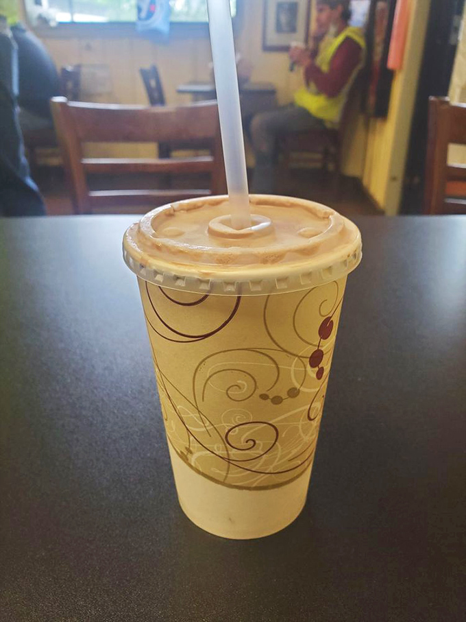This isn't just a chocolate shake—it's liquid nostalgia in a cup, reminding you of simpler times when happiness was measured in sips.