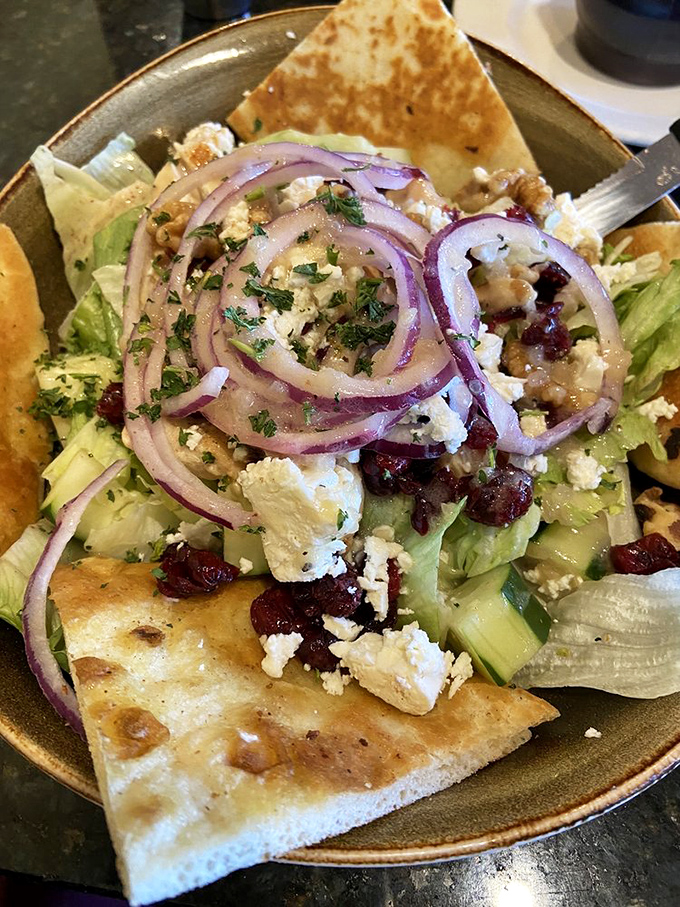 A chopped salad that actually makes eating vegetables exciting. Those pita triangles are the perfect edible spoons for all that Mediterranean goodness.