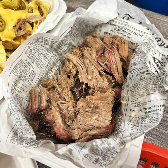 Chopped brisket that looks like it's been kissed by smoke for hours&mdash;because it has. Newspaper: not just for reading anymore.