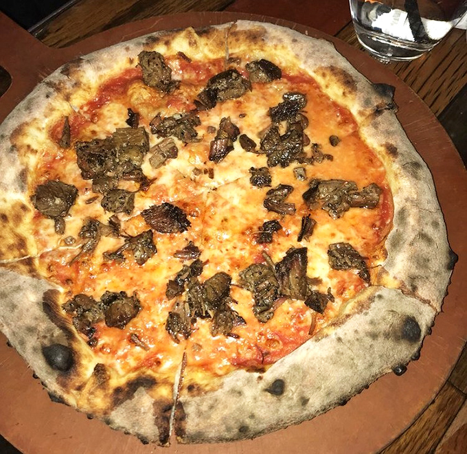 Pizza meets barbecue in this unexpected crossover hit. Smoky chopped brisket transforms an Italian classic into something uniquely American.