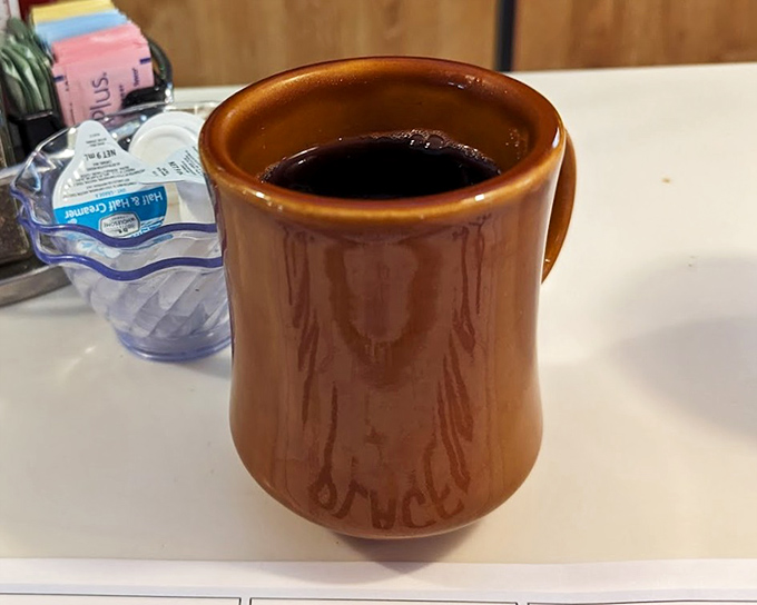 The humble diner mug—keeper of America's fuel, confidant to early risers, and the most essential hand-warming device ever created. Coffee just tastes better in these.