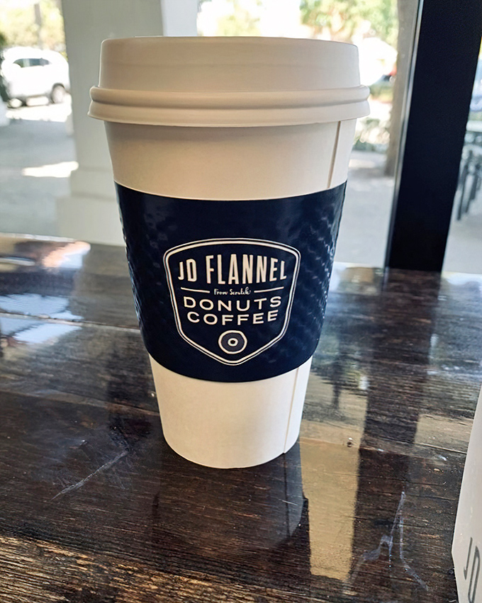 The coffee cup that says, "I'm serious about both my caffeine and my donuts." The perfect sidekick to your sweet adventure.