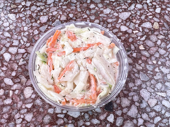Coleslaw that knows its supporting role &ndash; creamy, crunchy, and ready to complement the star of the show: perfectly prepared seafood.