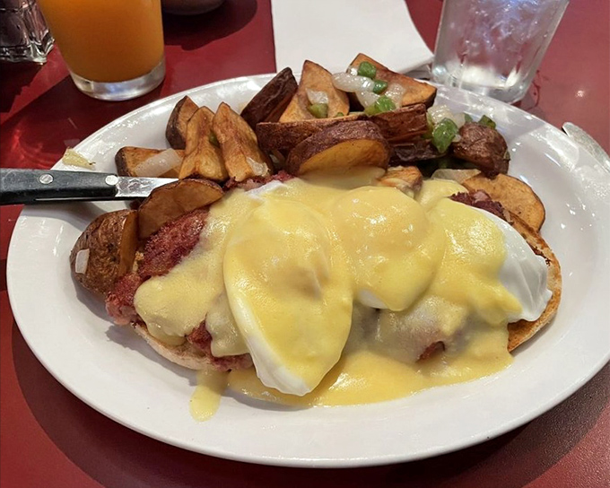 Eggs Benedict reimagined&mdash;Canadian bacon and poached eggs lounging beneath a hollandaise blanket that's sunshine on a plate.
