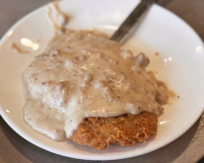 Country fried steak swimming in peppery gravy&mdash;the breakfast equivalent of a warm hug from your favorite aunt who doesn't care about your cholesterol.