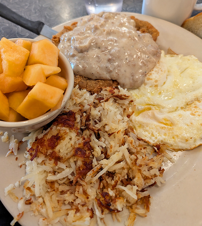 Country fried steak with that gorgeous golden crust delivers the kind of hearty satisfaction that fuels entire days.