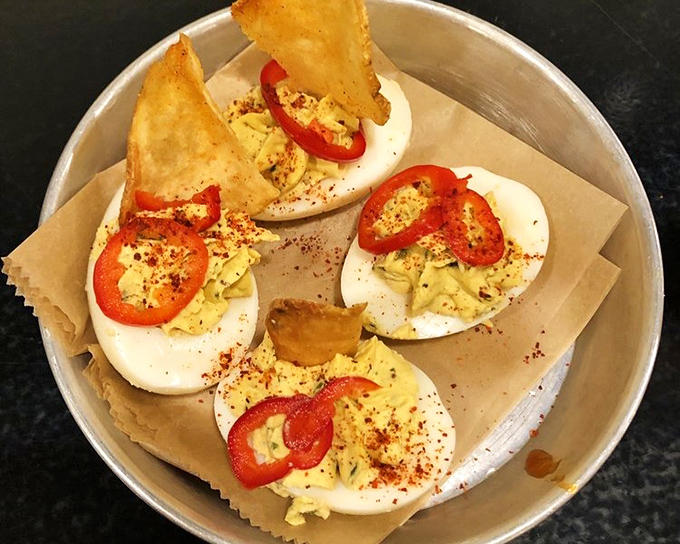 
These aren't your grandmother's deviled eggs&mdash;unless your grandmother was secretly a culinary revolutionary with a thing for Fresno chilies. 
