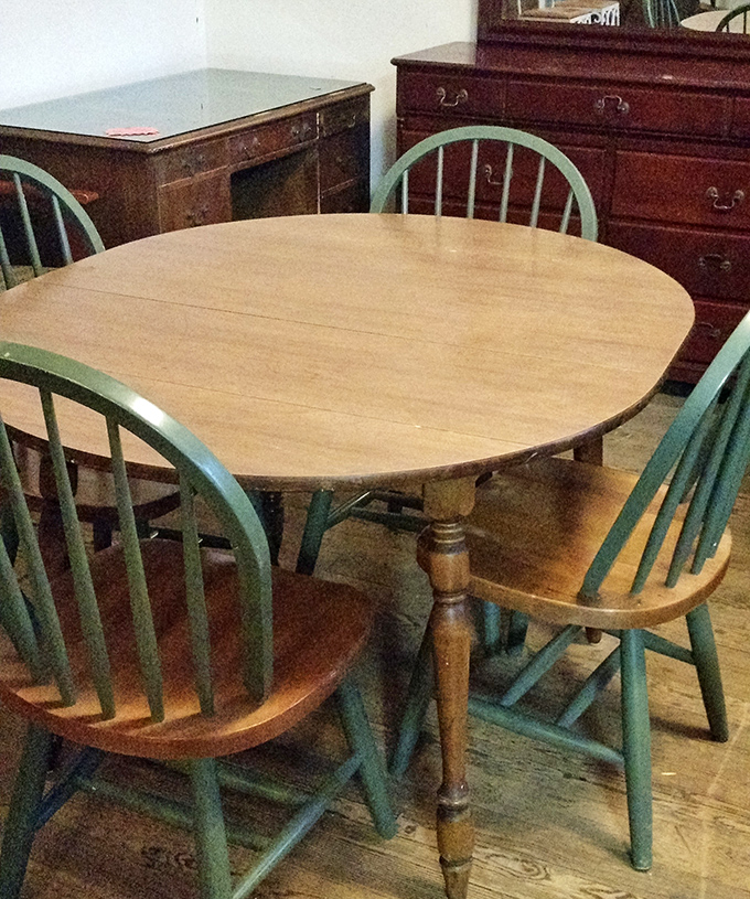Family dinners waiting to happen around this solid wood table with mint-green chairs &ndash; just add your own heated political discussions and meatloaf.