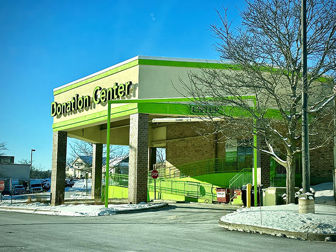 The neon green Donation Center &ndash; where the circle of thrift begins. Yesterday's donations become tomorrow's discoveries in this retail ecosystem.