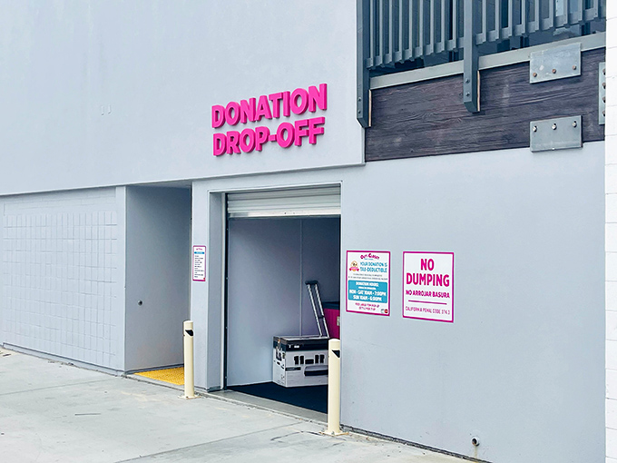 The pink "Donation Drop-Off" sign welcomes your gently-used treasures to begin their journey toward a second life and greater purpose.