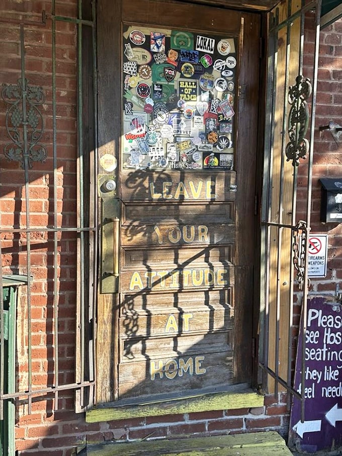 The door that separates ordinary life from extraordinary experiences. Covered in stickers and memories, it's the gateway to your next favorite meal.