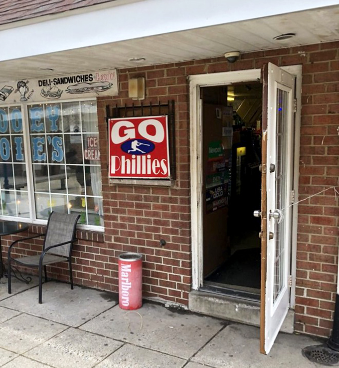 That Phillies sign isn't just decoration—it's a statement of local pride. This doorway is the portal to authentic Philadelphia flavor.
