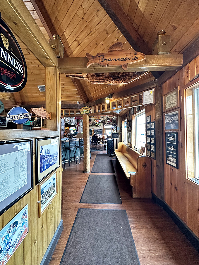 The hallway lined with wooden walls and maritime artifacts feels like a passage through Great Lakes history, leading to delicious destinations.