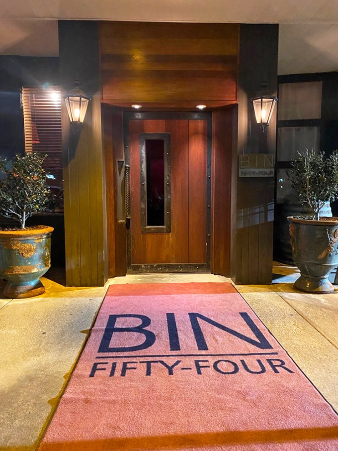 The entrance welcomes you with a red carpet treatment that hints at the culinary royalty awaiting inside.