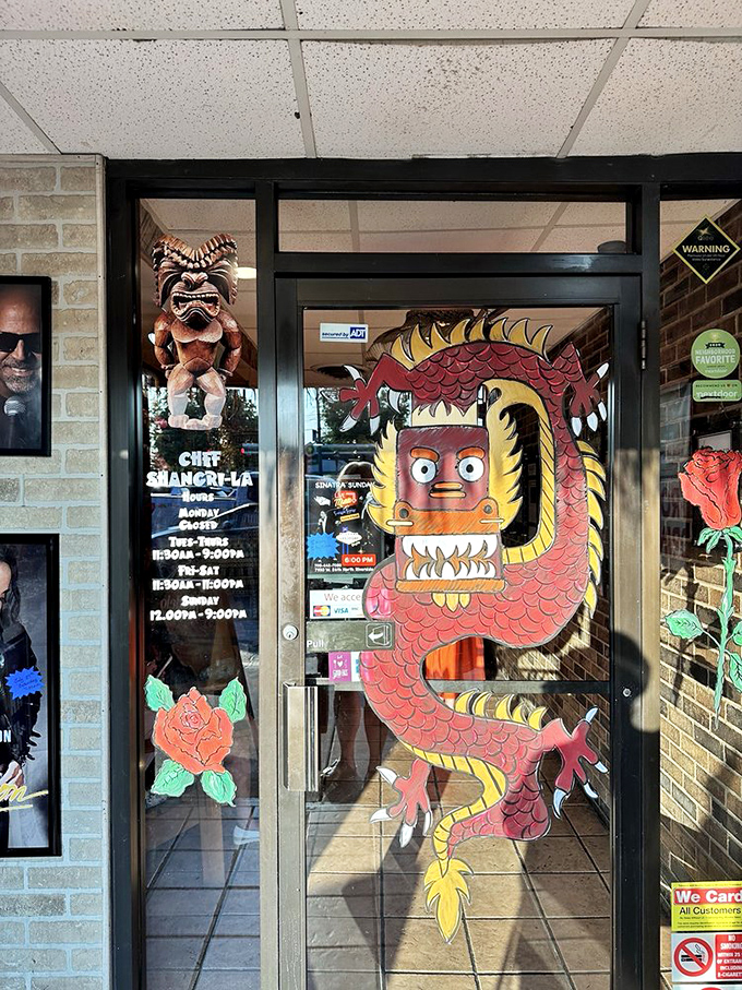 The dragon guards the entrance like a mythical ma&icirc;tre d'. He's seen thousands enter as strangers and leave as devoted regulars.