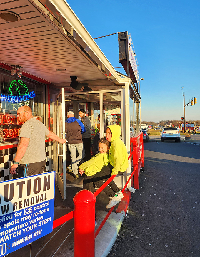 The entrance beckons like a portal to 1955, where calories don't count and happiness is mandatory.
