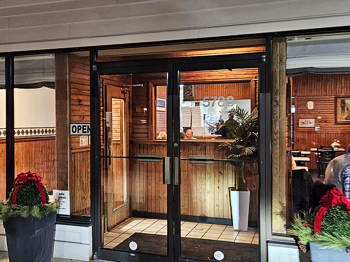 The entrance to pizza paradise, complete with seasonal decorations. That "OPEN" sign might be the most beautiful word in the English language when you're hungry for Enrico's.