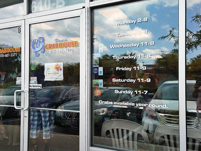 Business hours posted clearly because when crab cravings hit, you need to know exactly when salvation opens.