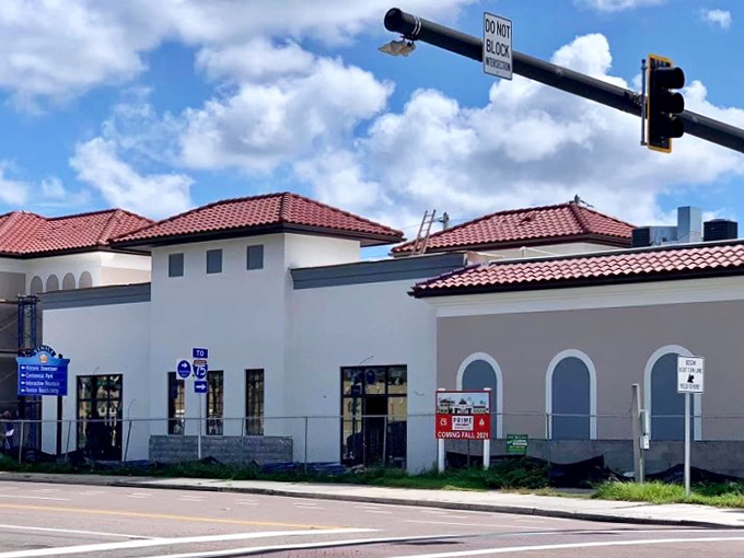 The Mediterranean-inspired architecture stands out against Florida's blue sky, like a beacon calling to all who appreciate the noble cow.