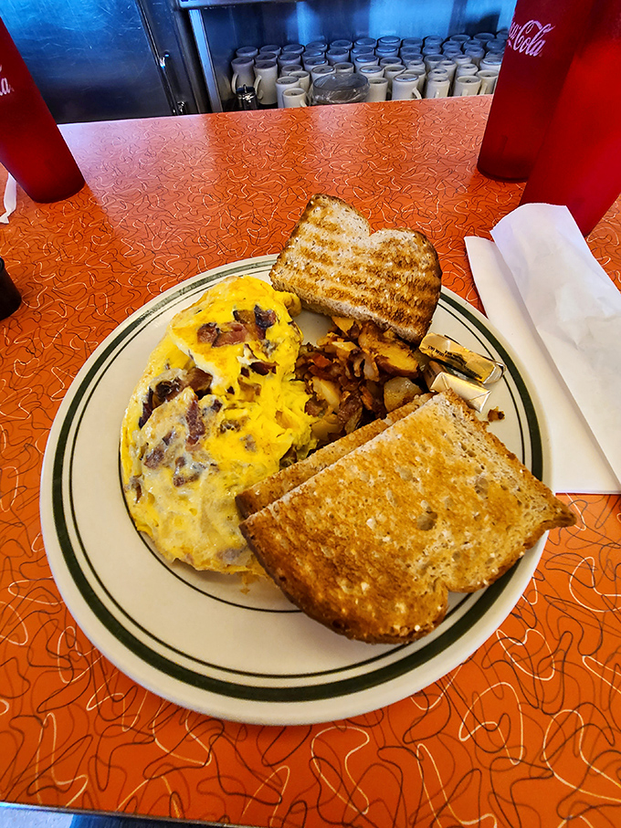 This omelet doesn't just satisfy hunger&mdash;it abolishes it. Perfectly executed breakfast classics that make chain restaurants weep with inadequacy.