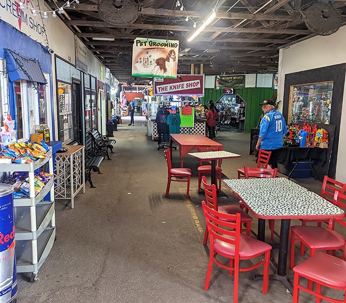 The market's food court offers a welcome respite for weary shoppers. Those red chairs have witnessed countless "I can't believe I found this" stories.