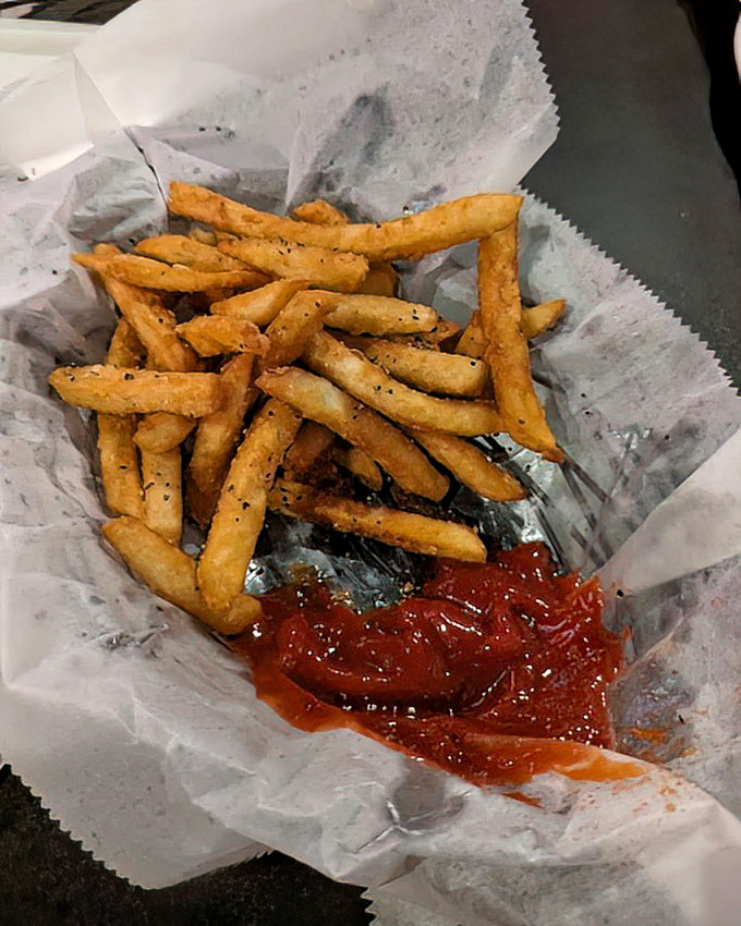 These aren't just fries—they're golden vessels for ketchup delivery. Crispy on the outside, fluffy inside, and utterly irresistible.