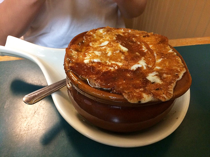 The French onion soup arrives with its cheese cap perfectly bronzed&mdash;a bubbling cauldron of flavor that's worth every potential chin burn.