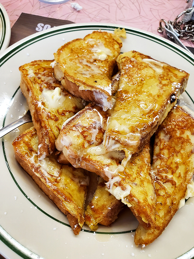 French toast that's dressed better than most people on vacation&mdash;golden, buttery, and absolutely dripping with sweet surrender.