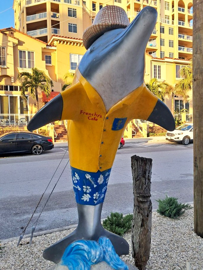This dapper dolphin mascot dressed better than most of us, welcoming guests with style and a permanent smile.