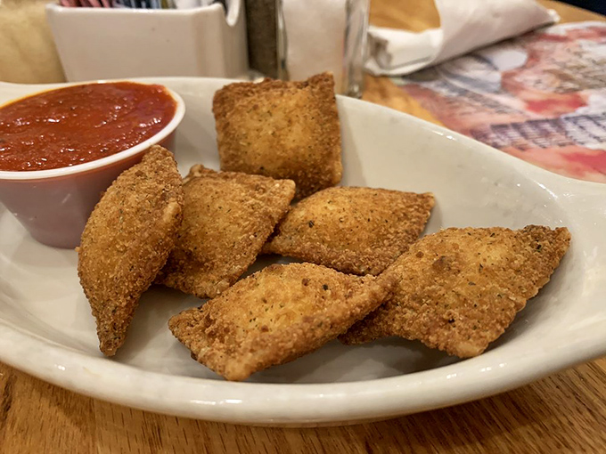 Golden-brown pillows of joy with marinara for dipping. Proof that the best things in life are indeed deep-fried and stuffed with cheese.