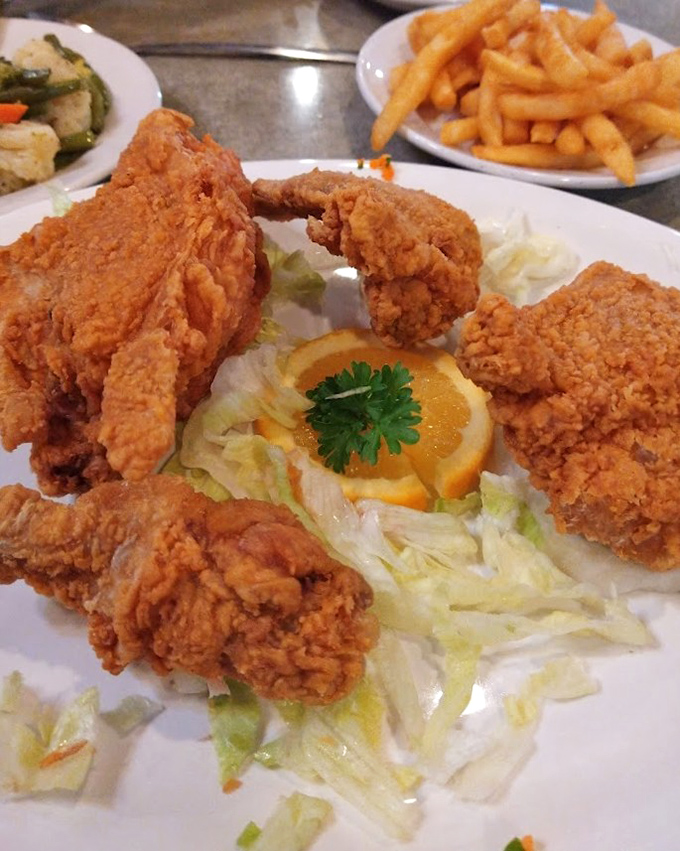 Fried chicken with a crust that crackles like autumn leaves. Golden, crispy perfection that makes you wonder why you'd ever eat anything else.