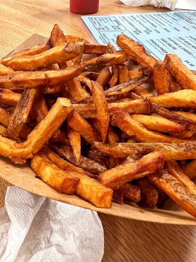 These hand-cut fries aren't just a side—they're co-stars. Golden, crispy exteriors giving way to fluffy centers—the perfect companion to that legendary burger.