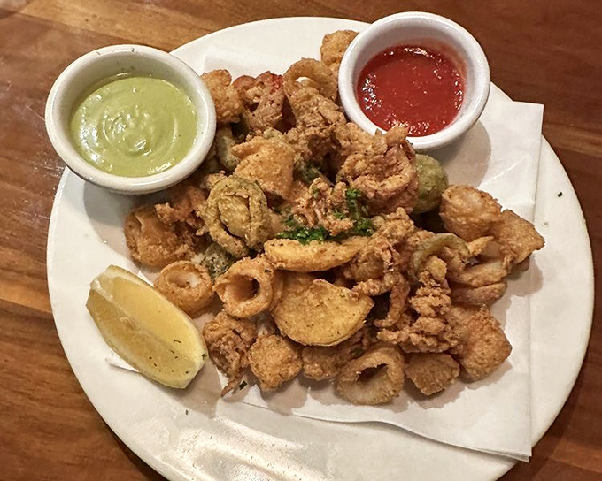 Fritto misto that achieves the impossible: deep-fried perfection that feels light enough to justify ordering another cocktail.