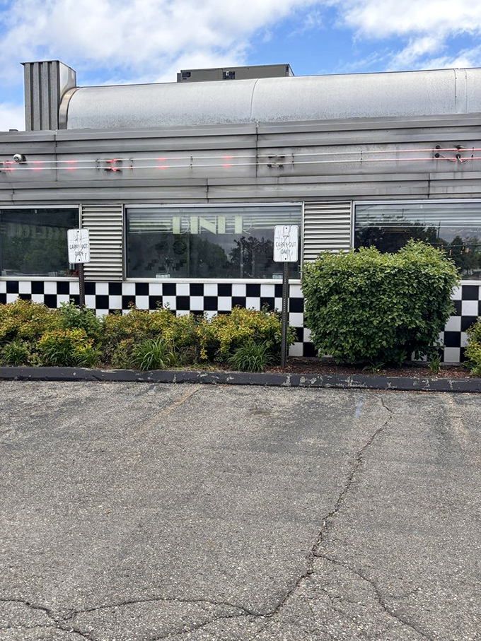 That checkered exterior trim isn't just decoration&mdash;it's a finish line flag signaling you've arrived at your comfort food destination.