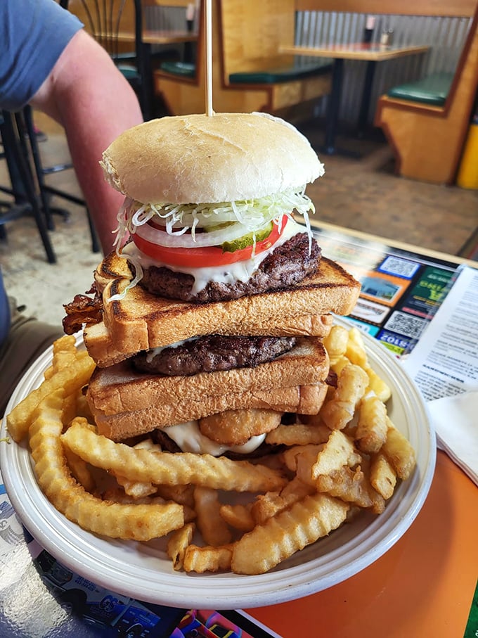 This towering burger creation isn't just a meal, it's a challenge&mdash;a delicious Jenga tower of beef, cheese, and toast that dares you to find your strategy.