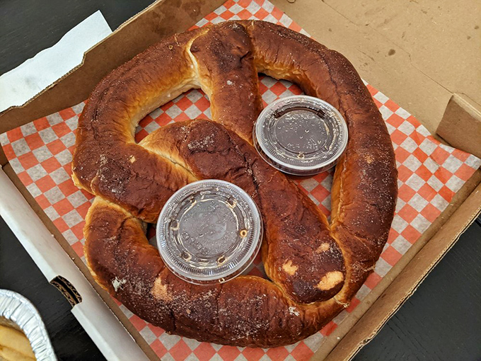 A pretzel so massive it needs its own zip code. The cinnamon sugar coating transforms this Bavarian classic into a dessert worthy of worship.