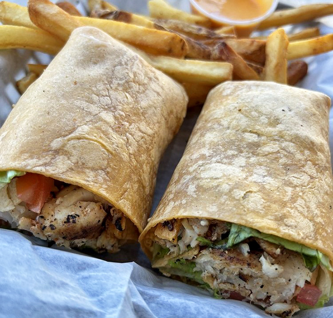 The grouper wrap &ndash; proof that sometimes the best things come in tortilla packages. Blackened seasoning meets fresh vegetables in a handheld masterpiece.