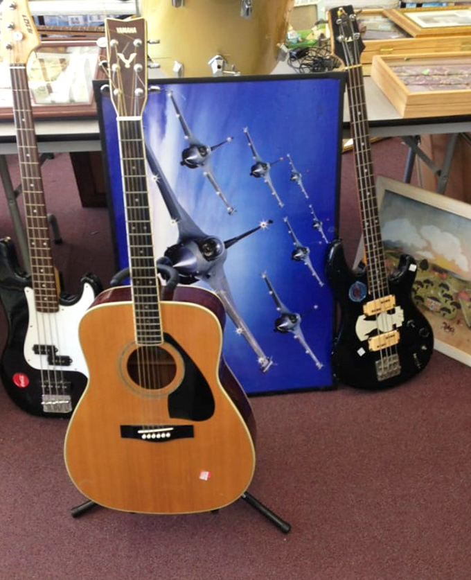 A Yamaha acoustic flanked by its electric cousins&mdash;like finding the Eagles, Hendrix, and Bootsy Collins all jamming at your local coffee shop.