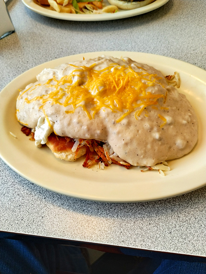 The infamous "gut buster" breakfast—where gravy isn't a condiment, it's a lifestyle choice. Your cardiologist just felt a disturbance in the force.