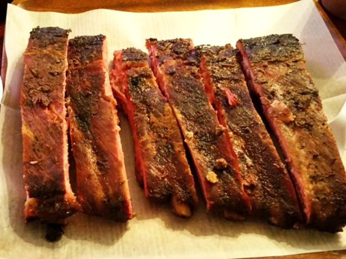 These ribs aren't just smoked&mdash;they're transformed into meat candy with a bark so perfect it should be hanging in the Louvre.