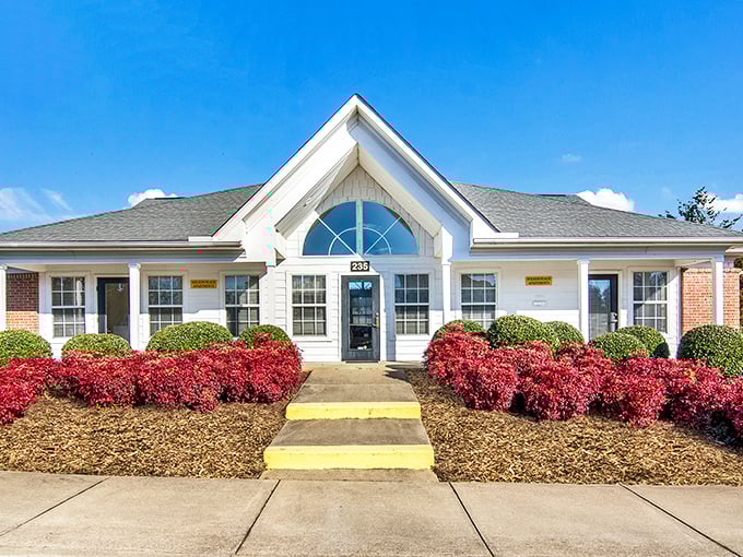 Highland Glen Apartments offer mountain living where front porches and friendly neighbors create genuine community connections daily.