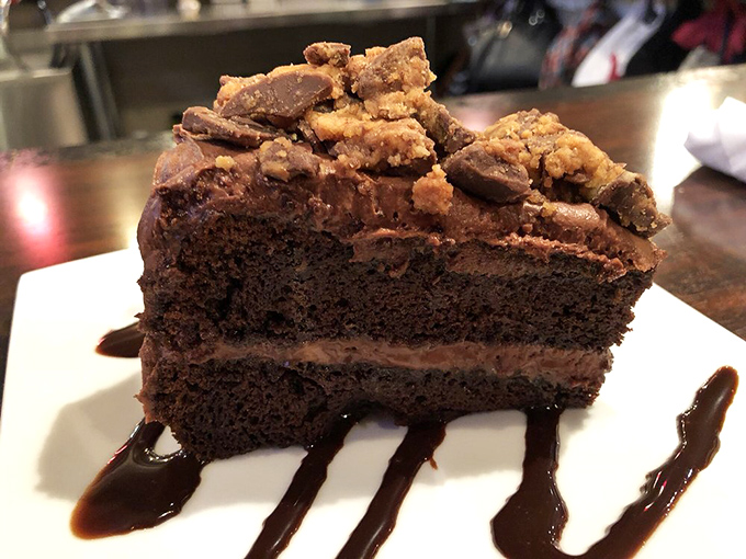This isn't just chocolate cake&mdash;it's a monument to decadence. Peanut butter cups and fudge sauce turn dessert into an experience worth saving room for.